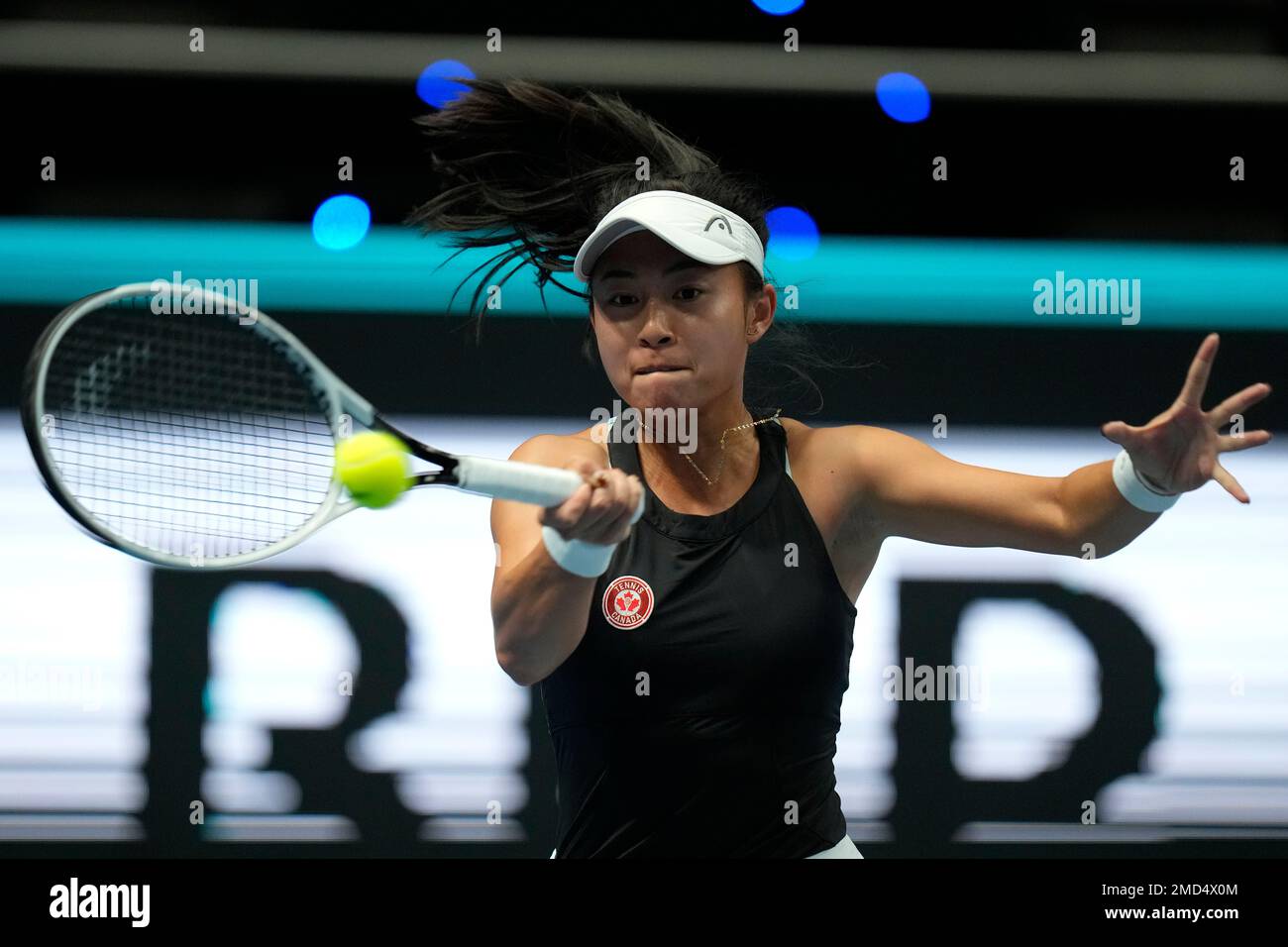Canada's Carol Zhao returns a ball to Russia's Daria Kaasatkina during ...