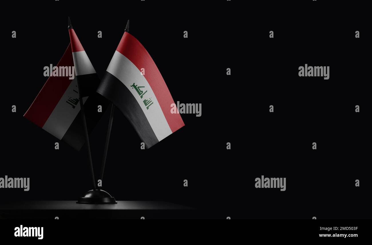 Small national flags of the Iraq on a black background Stock Photo - Alamy