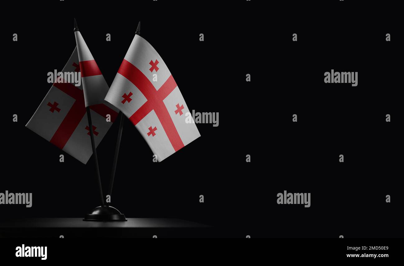 Small national flags of the Georgia on a black background Stock Photo ...