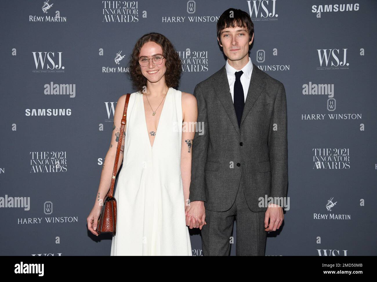Artist Ella Emhoff, left, and Sam Hine attend the WSJ. Magazine ...