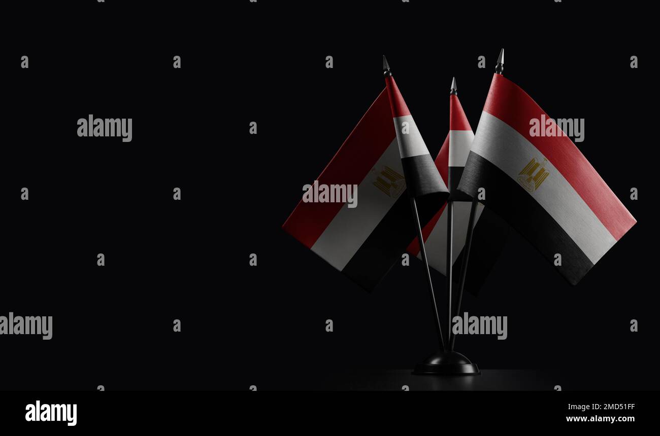 Small national flags of the Egypt on a black background Stock Photo - Alamy