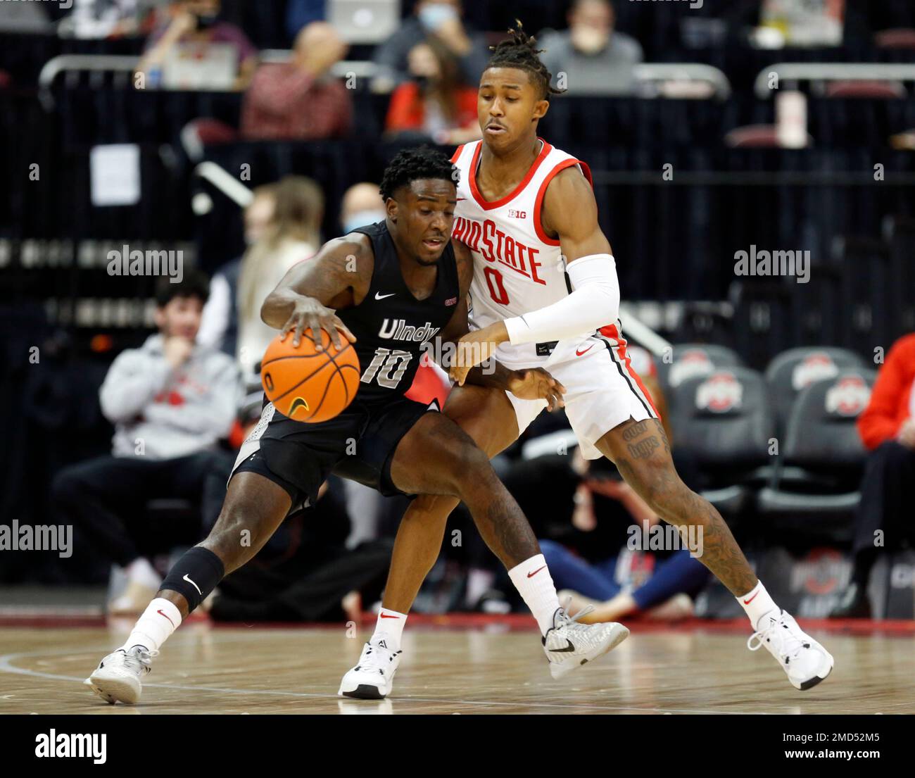 Indianapolis guard Dee Montgomery, left, drives against Ohio State ...
