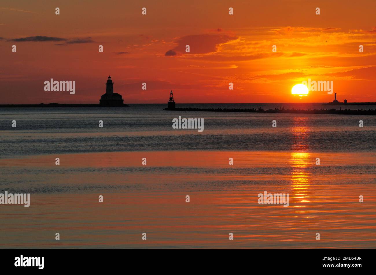 Chicago, Illinois, USA. The Chicago Harbor Lighthouse at sunrise over ...