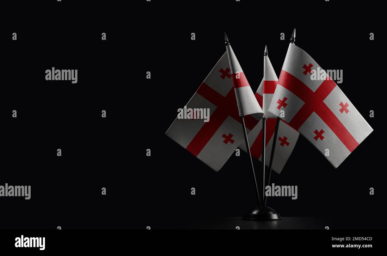 Small national flags of the Georgia on a black background Stock Photo ...