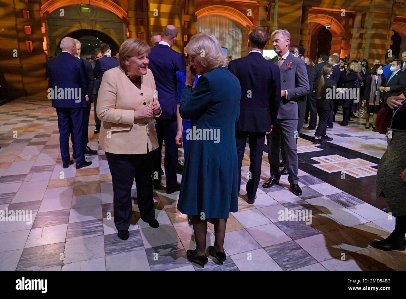 German Chancellor Angela Merkel, left, speaks to Camilla, Duchess of ...