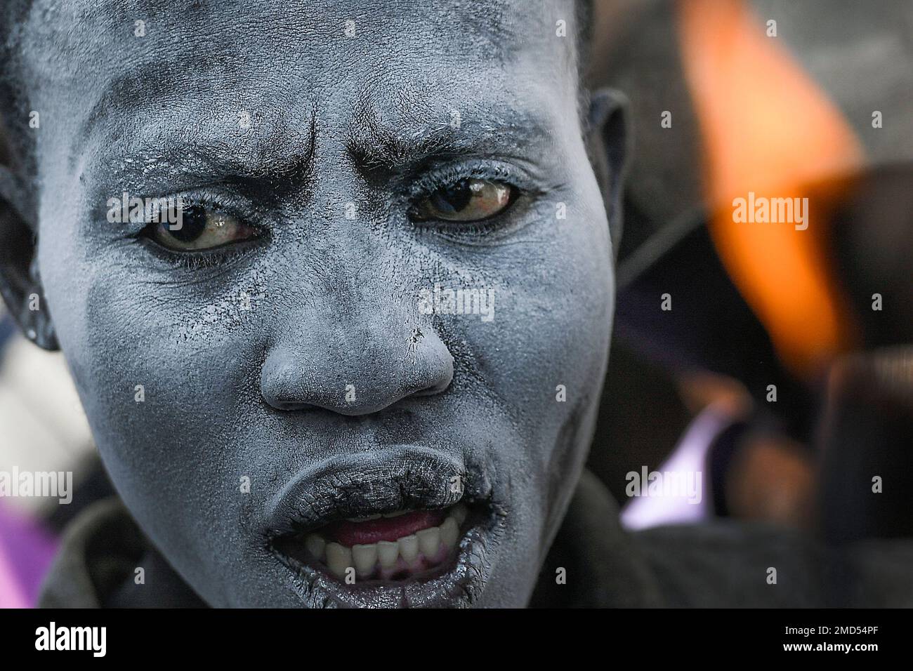 A person believed to be possessed with the spirit of Gede attends a ...