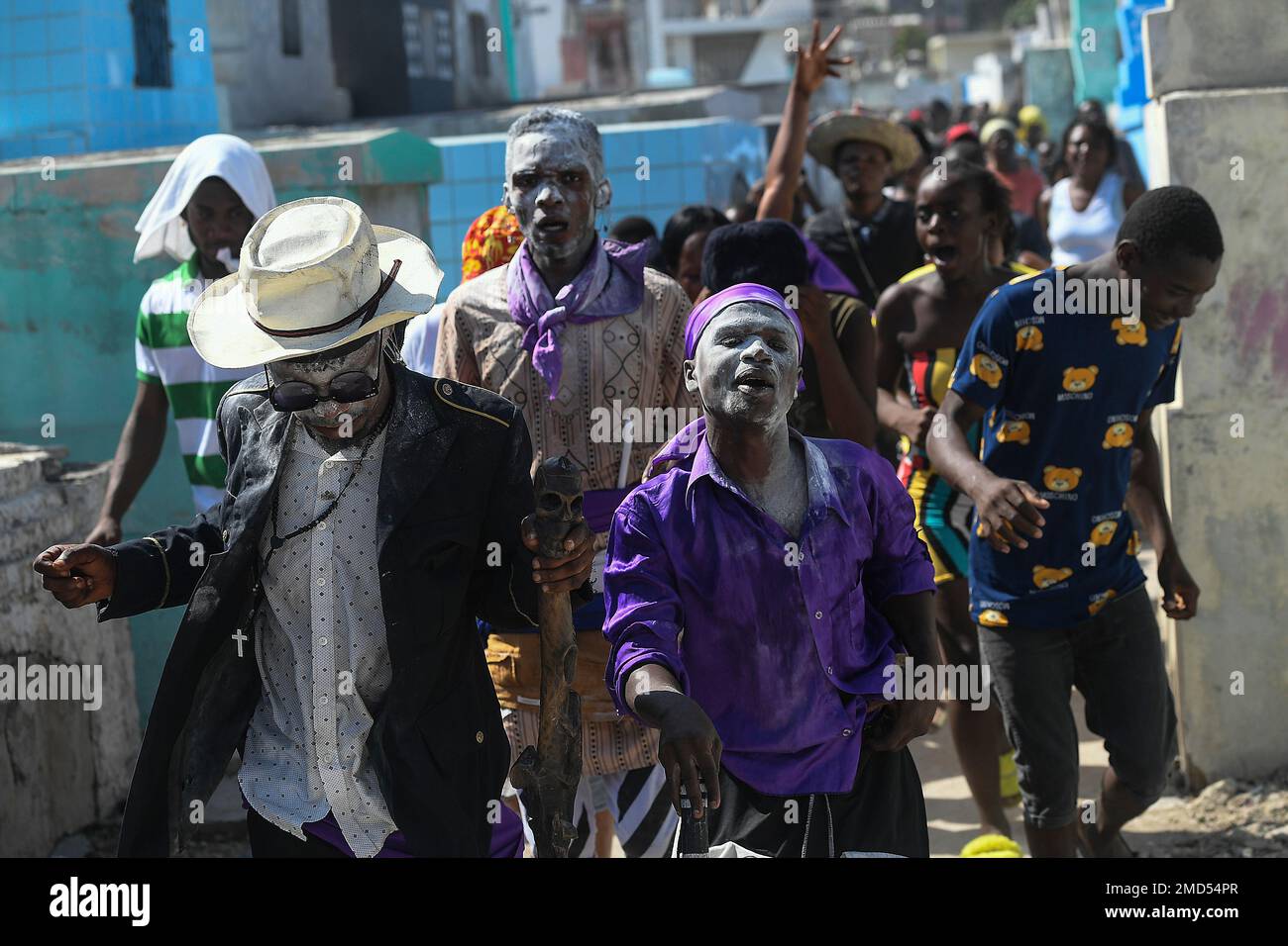 People believed to be possessed with the Gede spirit hold a ceremony ...