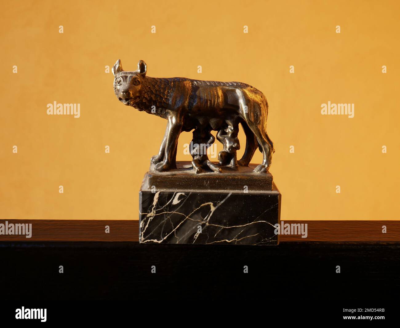 Scale reproduction of the Capitoline she-wolf suckling Romulus and ...