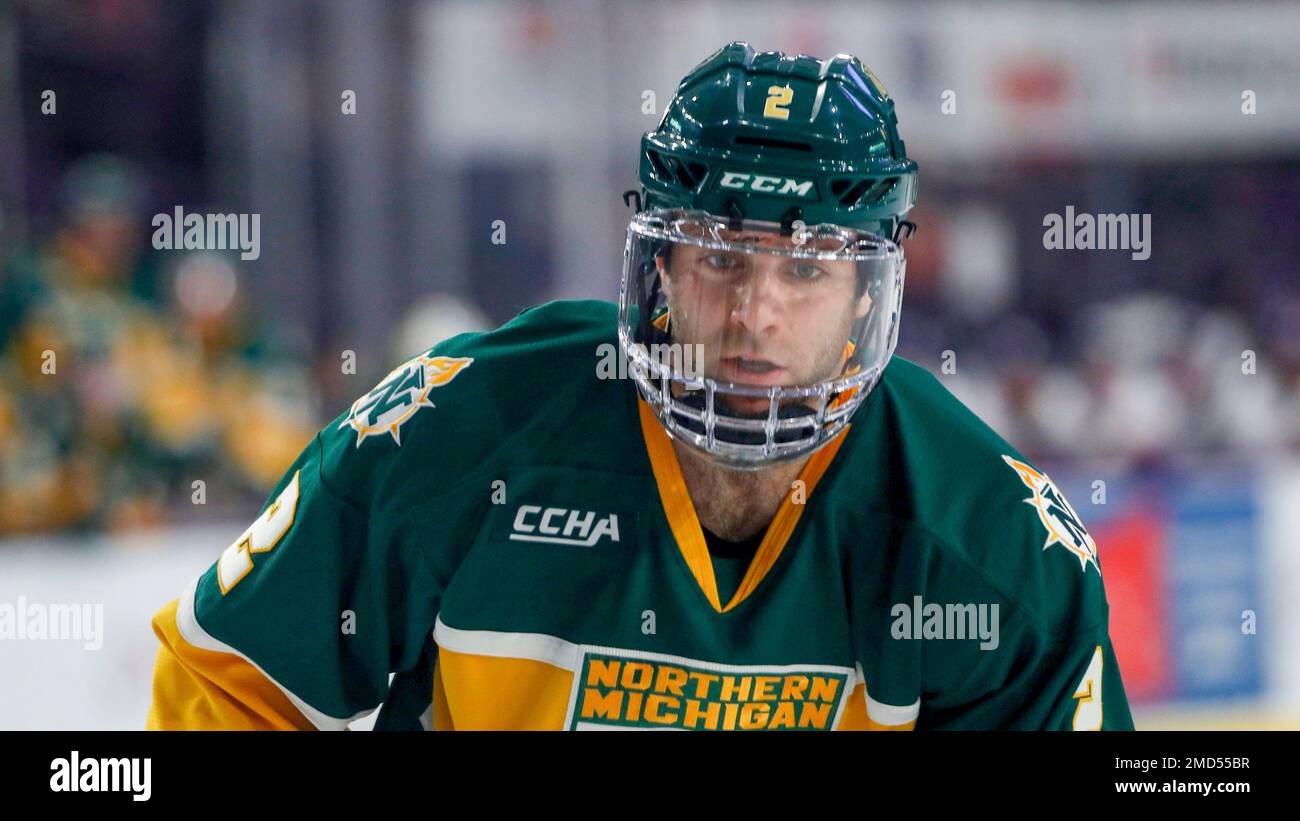 Northern Michigan defenseman Trevor Cosgrove (2) skates against ...