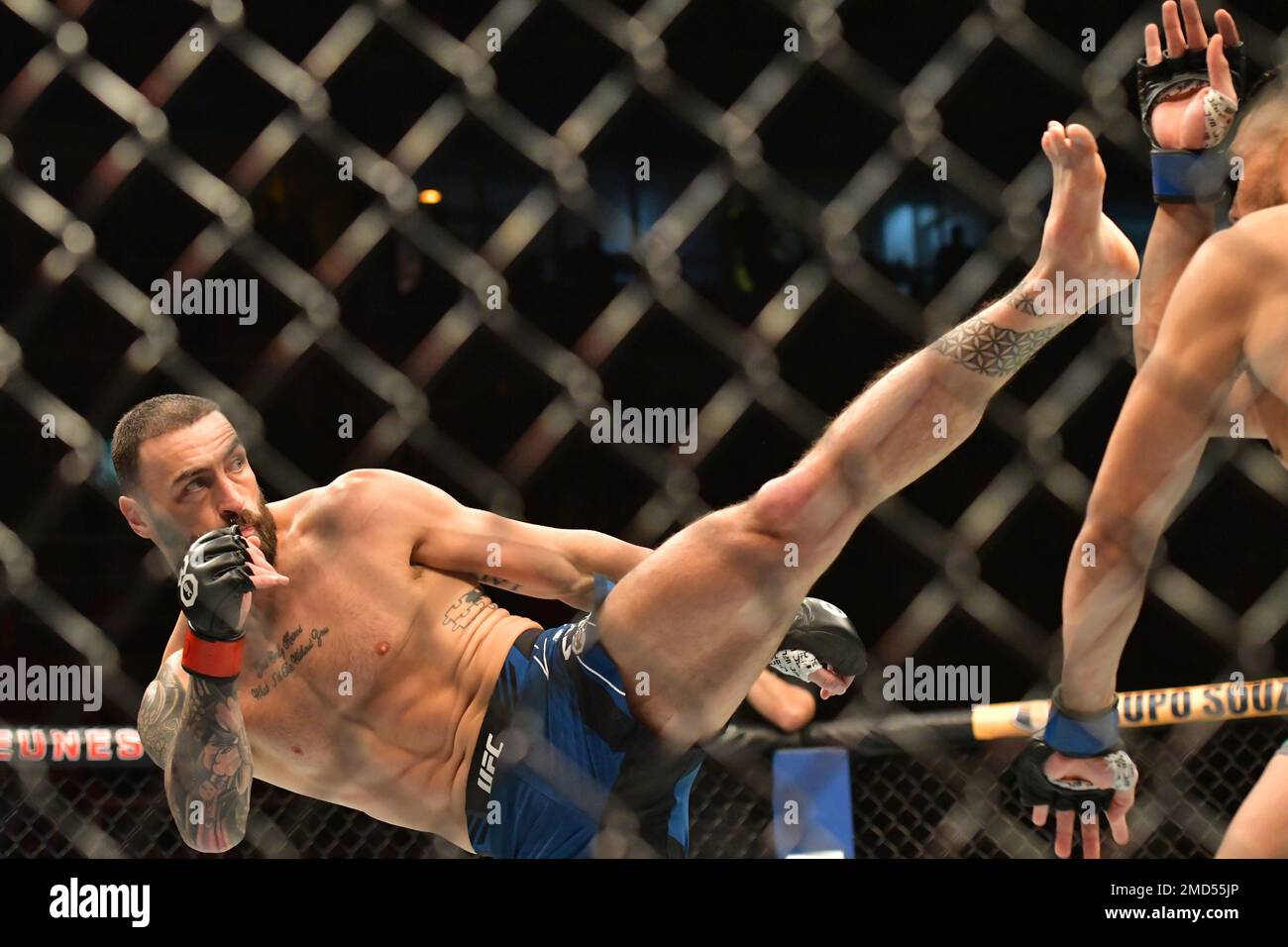 RIO DE JANEIRO, RJ - JANUARY 22: (L-R) Paul Craig kicks Johnny Walker ...