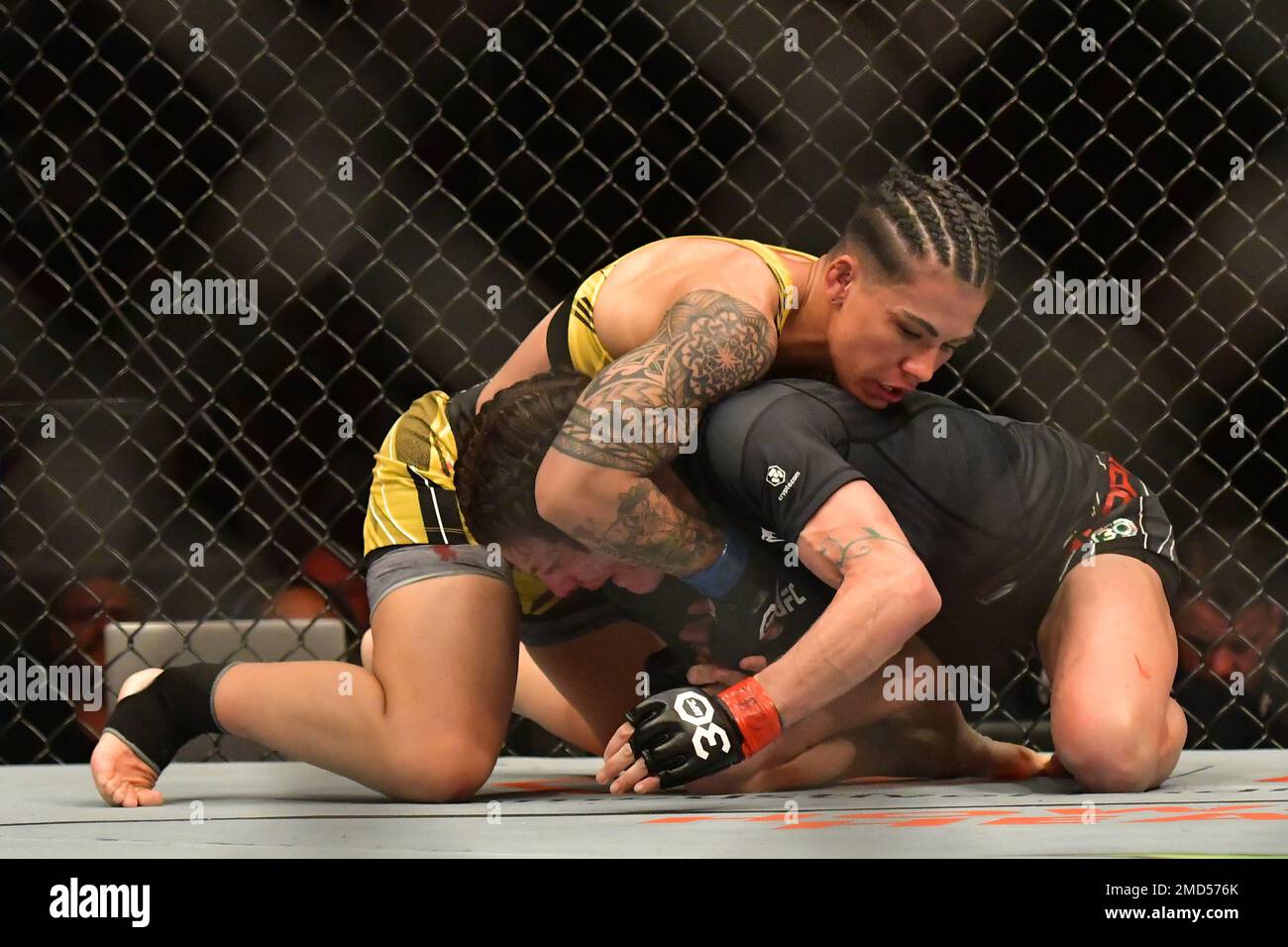 RIO DE JANEIRO, RJ - JANUARY 22: (L-R) Jéssica Andrade controls the ...