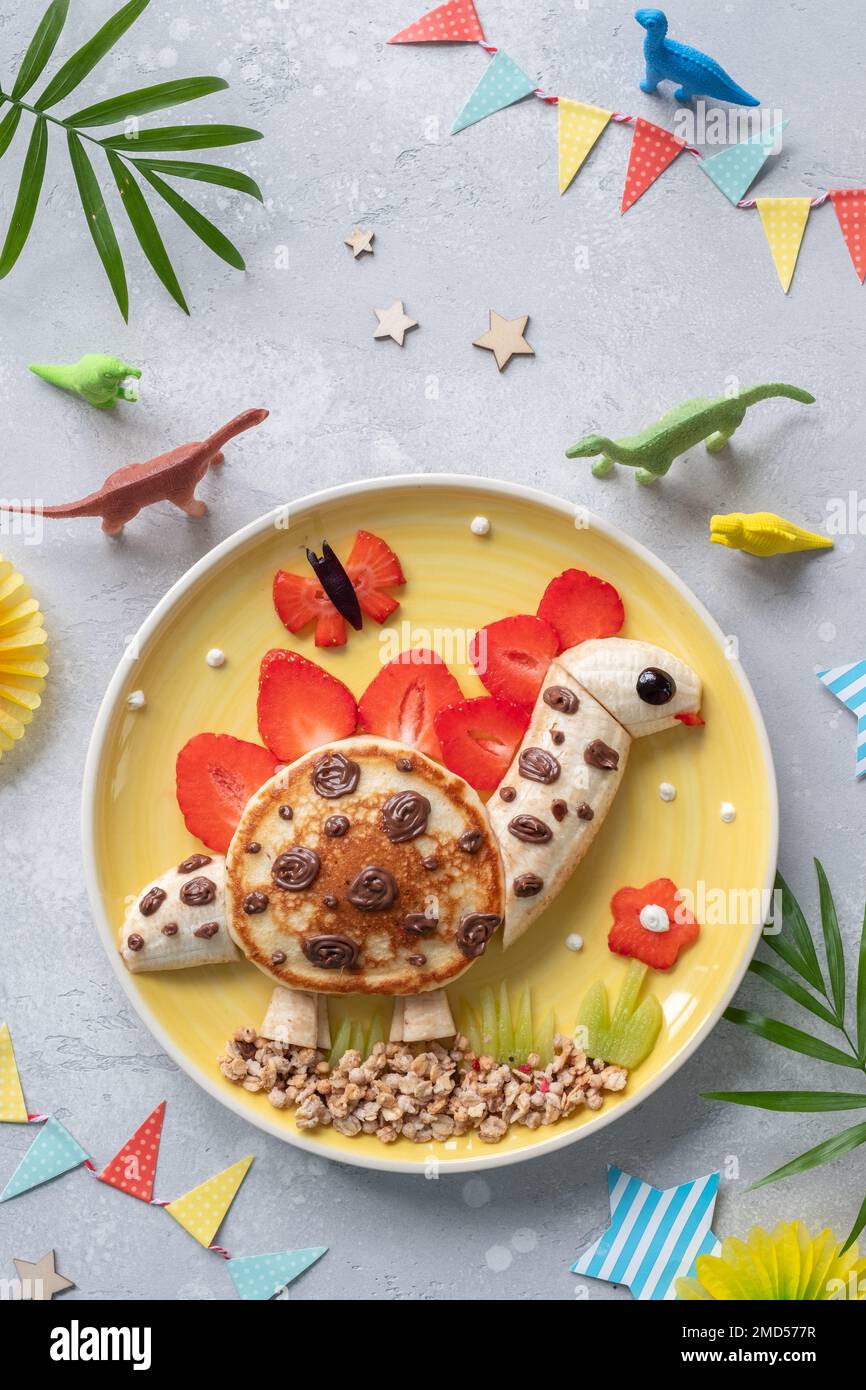 Cute dinosaur shaped pancake Stock Photo - Alamy