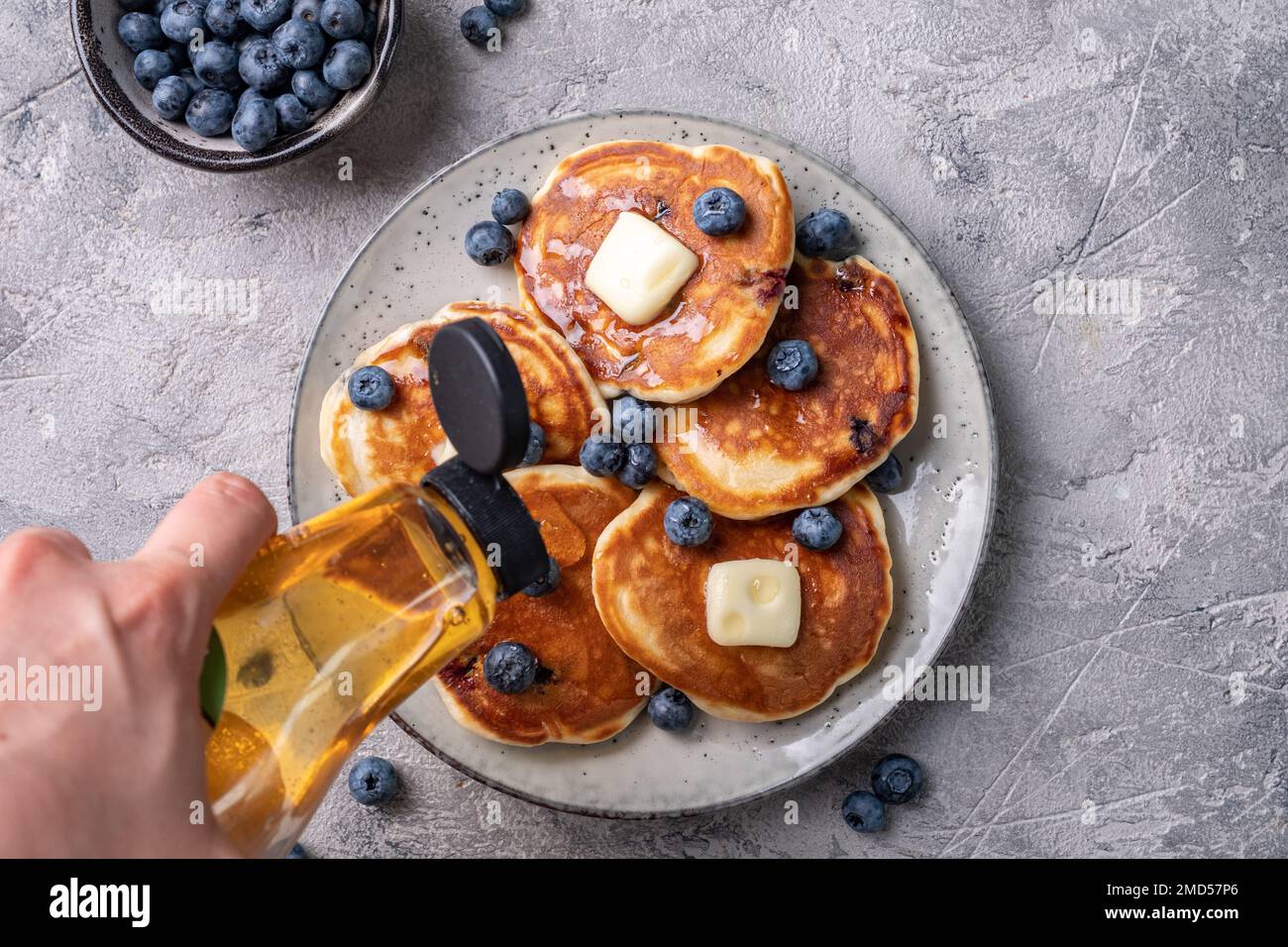 Buttermilk blueberry pancakes with maple syrup Stock Photo - Alamy