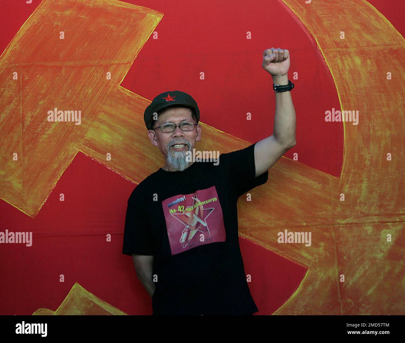 FILE - Communist rebel Jorge Madlos poses for photos during the ...