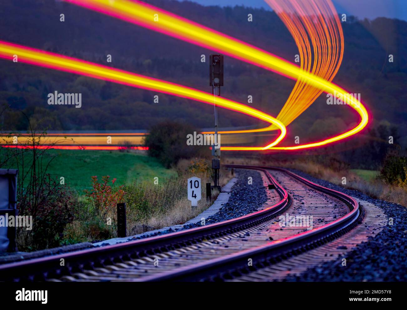 Long exposure photo shows a regional train in the Taunus region near ...