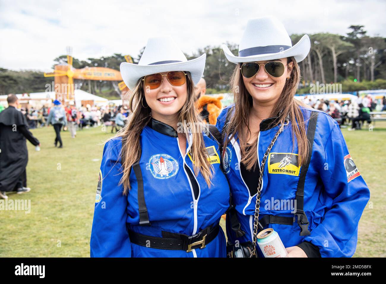 Festivalgoers in Halloween costumes are seen at the Outside Lands Music ...
