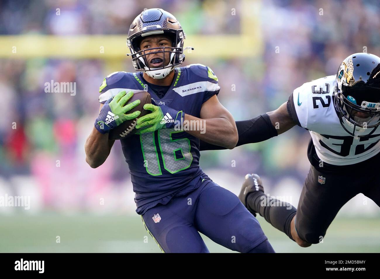 Seattle Seahawks Tyler Lockett (16) runs with the ball after a pass ...