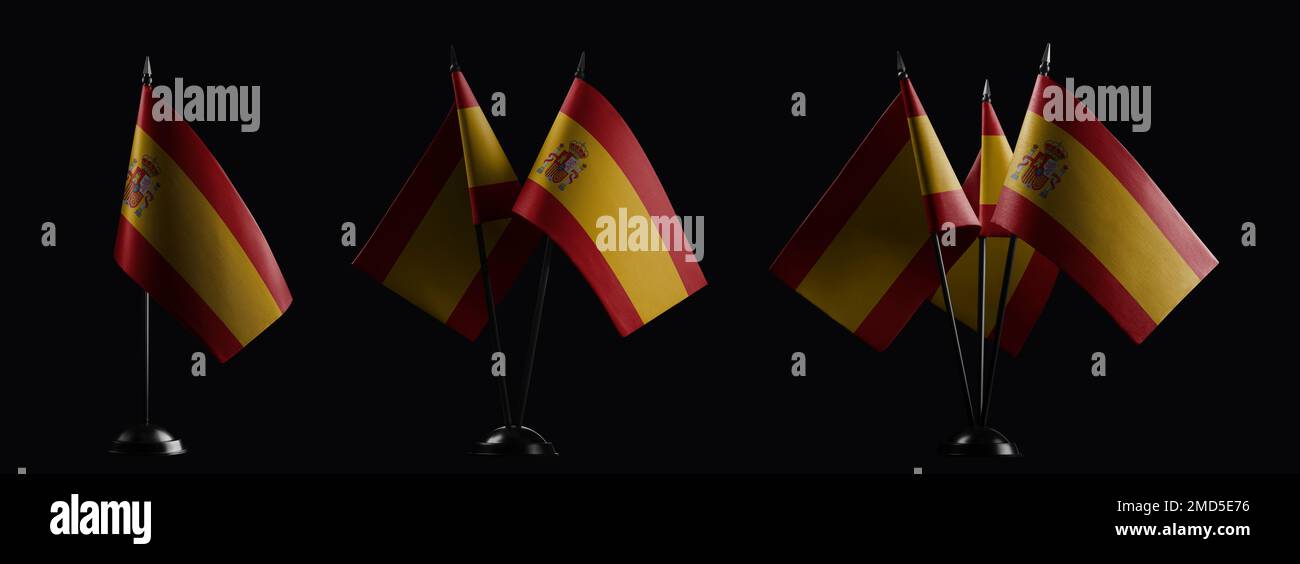 Small national flags of the Spain on a black background Stock Photo - Alamy