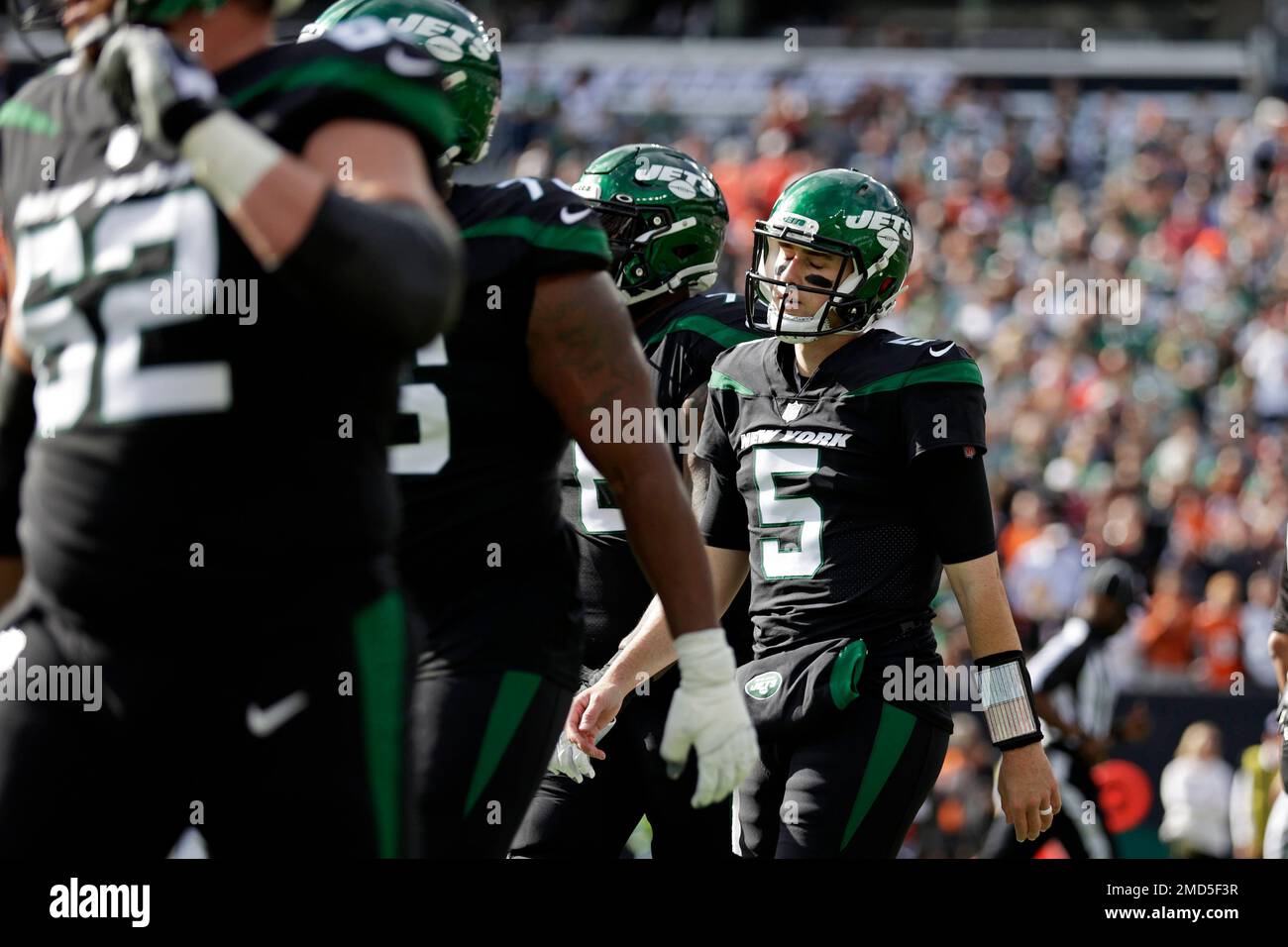 New York Jets quarterback Mike White (5) reacts walking off the field ...
