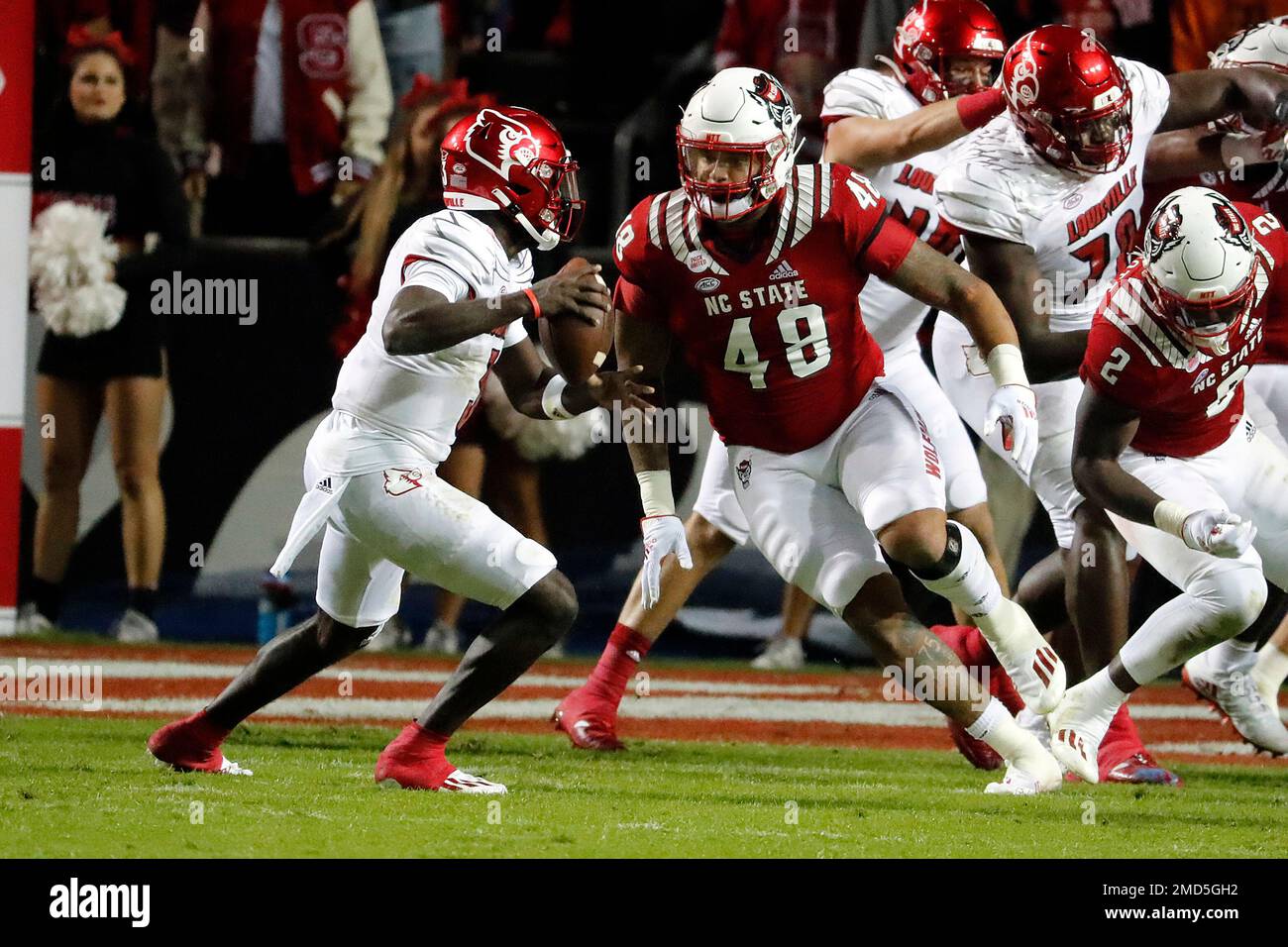 Louisville's Malik Cunningham (3) tries to pass the ball ahead of the ...