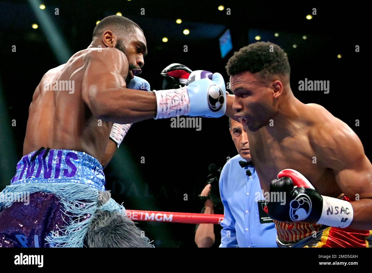 Jaron Ennis and Thomas Dulorme, of Puerto Rico, fight during a ...