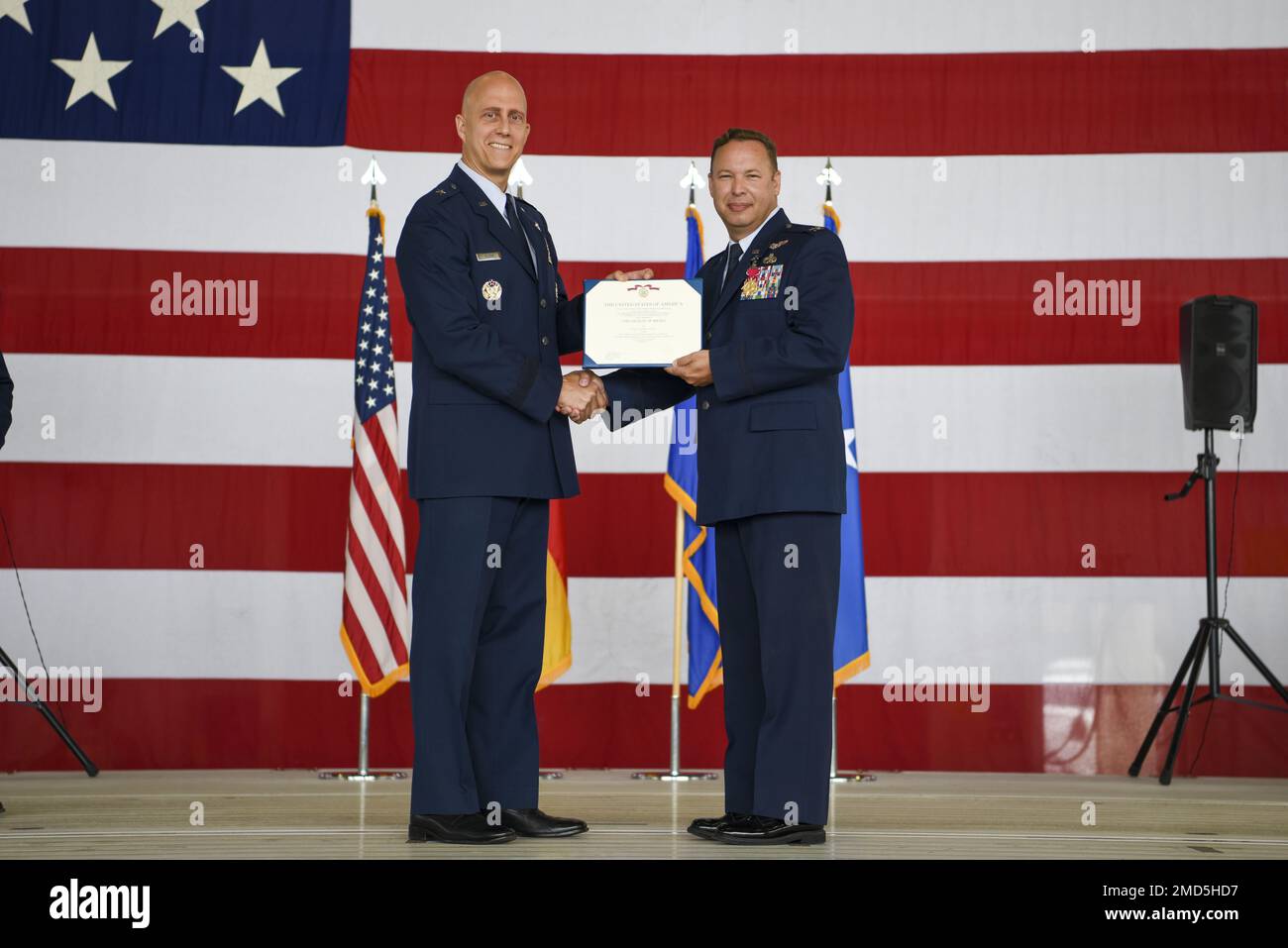 U.S. Air Force Brig. Gen. Josh Olson, 86th Airlift Wing commander, left ...