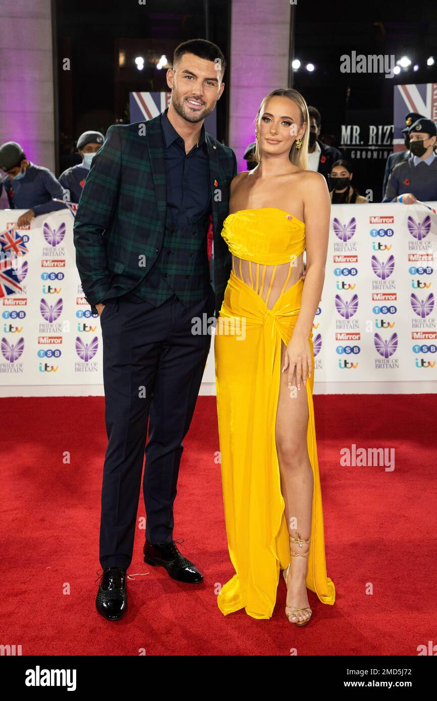 Liam Reardon, left, and Millie Court pose for photographer upon arrival ...