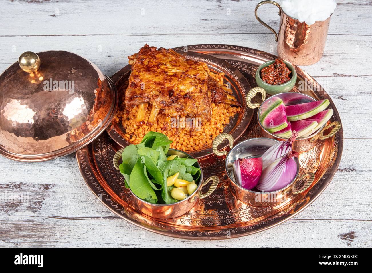 Lamb ribs on bulgur pilaf. Stuffed Ribs isolated on black background ...