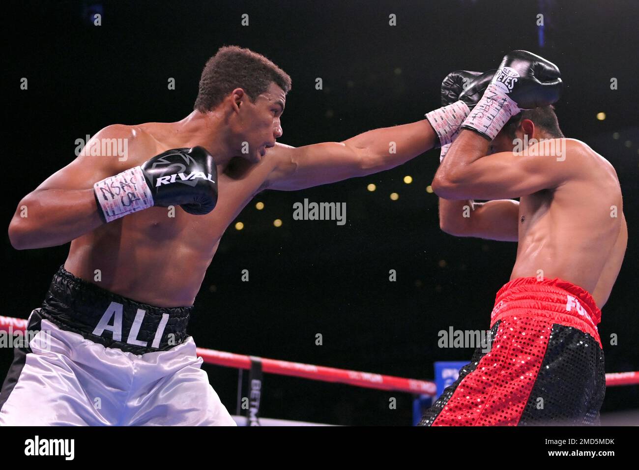 Michel Rivera, of the Dominican Republic, throws a left at Jose Matias ...