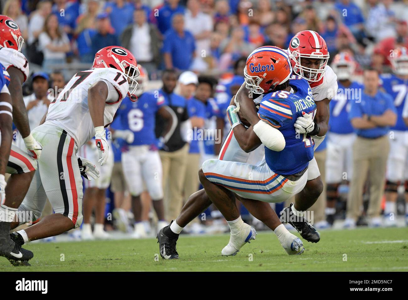 Florida quarterback Anthony Richardson (15) is tackled by Georgia ...