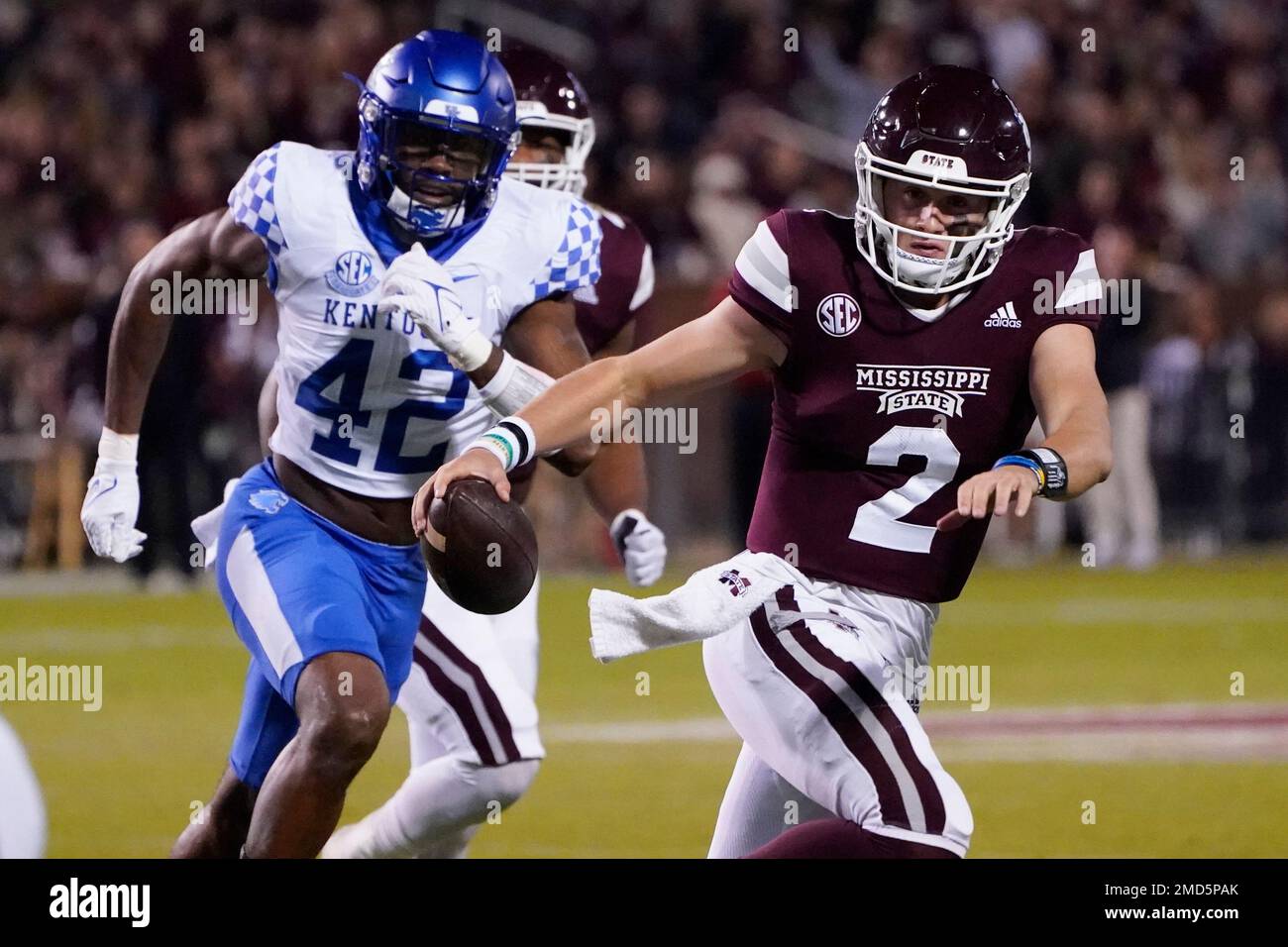 Mississippi State quarterback Will Rogers (2) is pursued by Kentucky ...