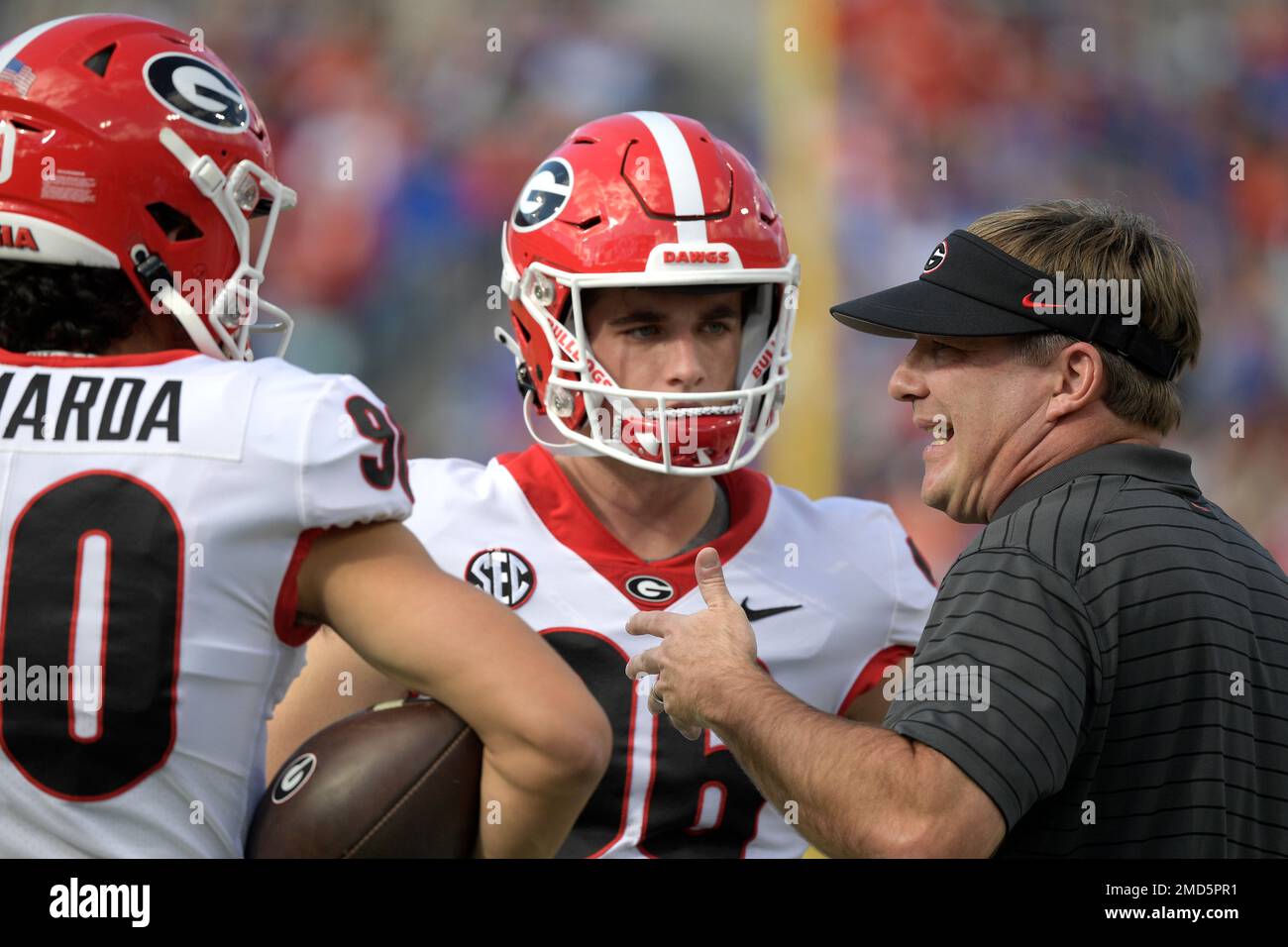 Georgia head coach Kirby Smart, right, talks with place kicker Jake ...