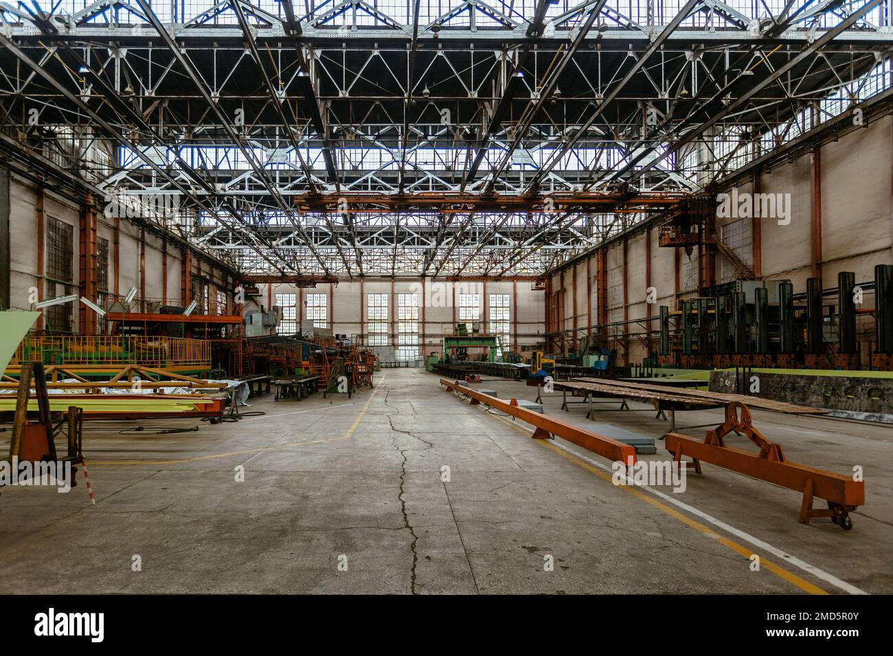 Heavy mechanical engineering factory production line. Interior of large ...