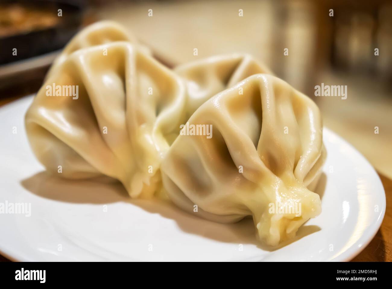 Traditional georgian khinkali cooked in hi-res stock photography and ...