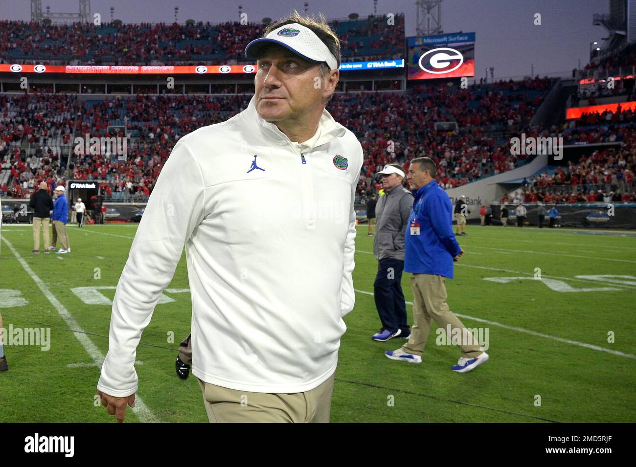 Florida head coach Dan Mullen walks off the field after a loss to ...