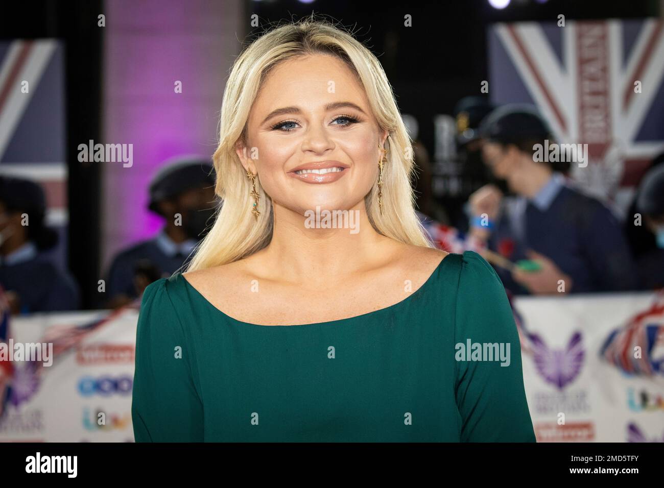 Emily Atack poses for photographer upon arrival at the Pride of Britain ...