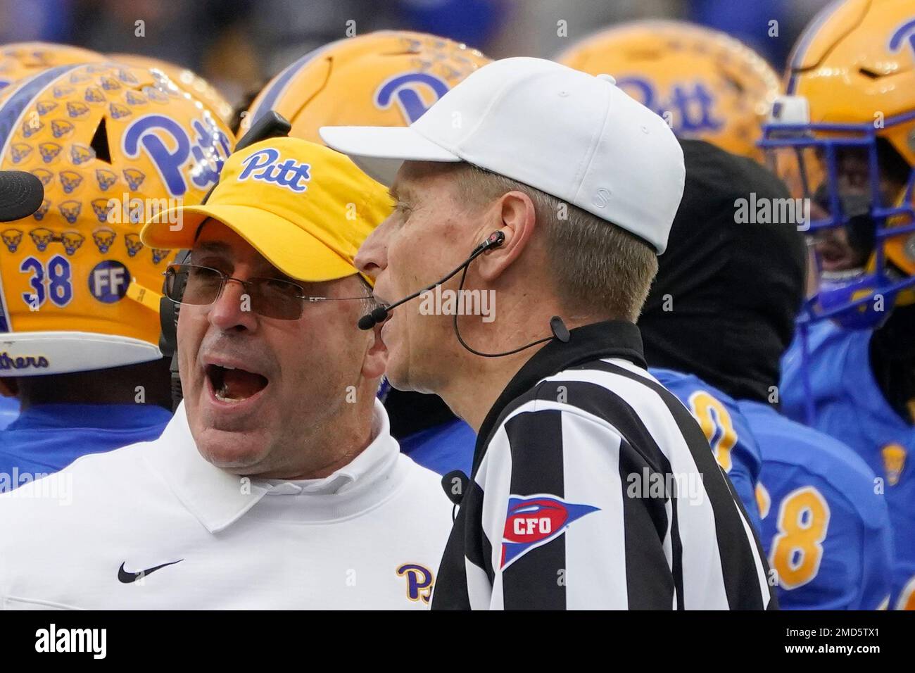 Pittsburgh head coach Pat Narduzzi, left, talks with referee Jeff ...