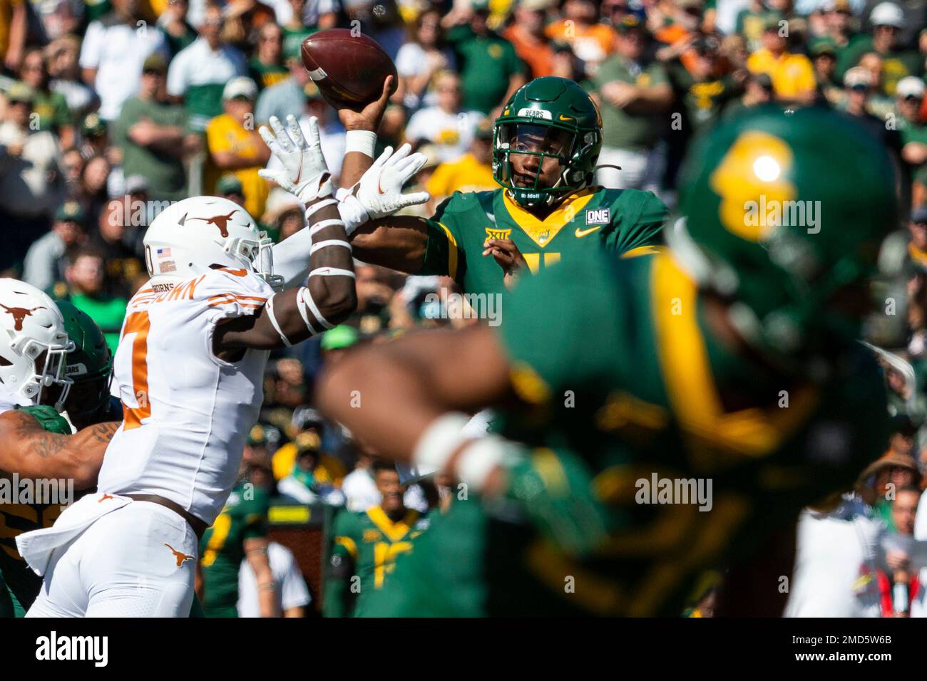 Baylor quarterback Gerry Bohanon (11) throws a pass as Texas linebacker ...