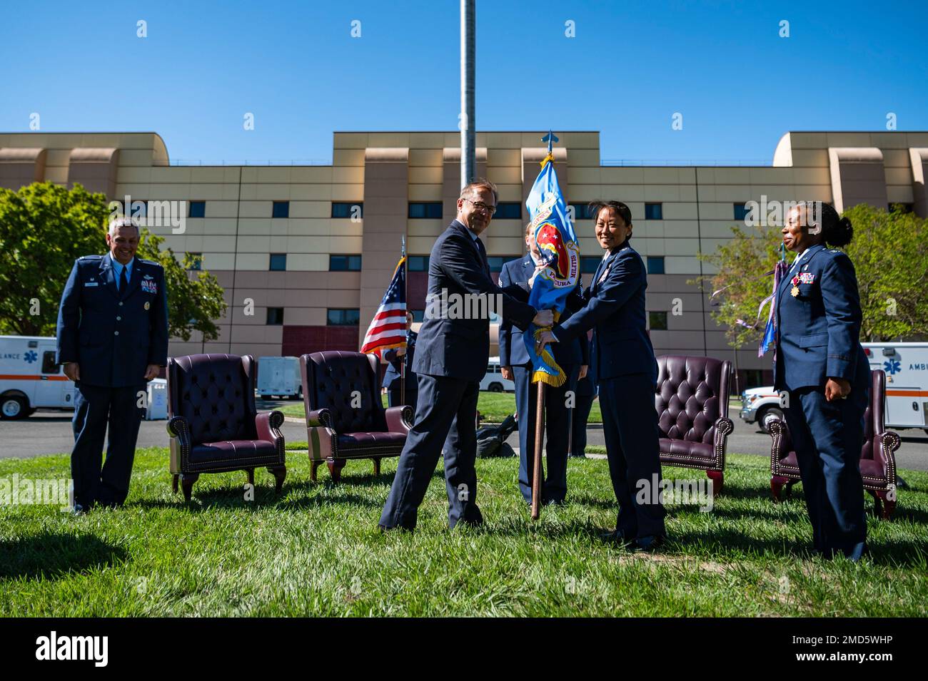 Dr. Brian Lein, center left, Defense Health Agency assistant director ...
