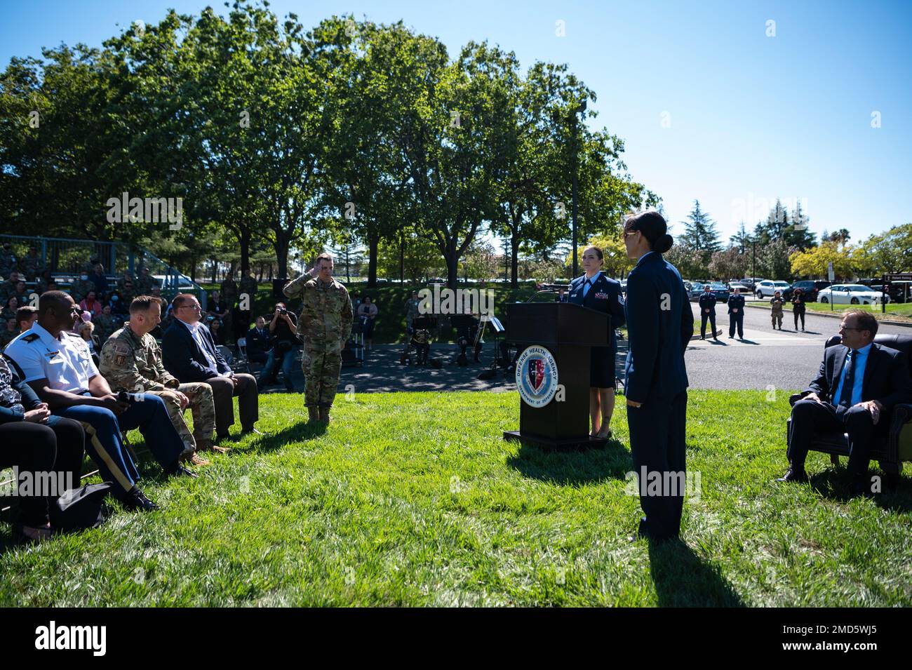 U.S. Air Force Col. Keegan Lyons, left, Defense Health Agency ...