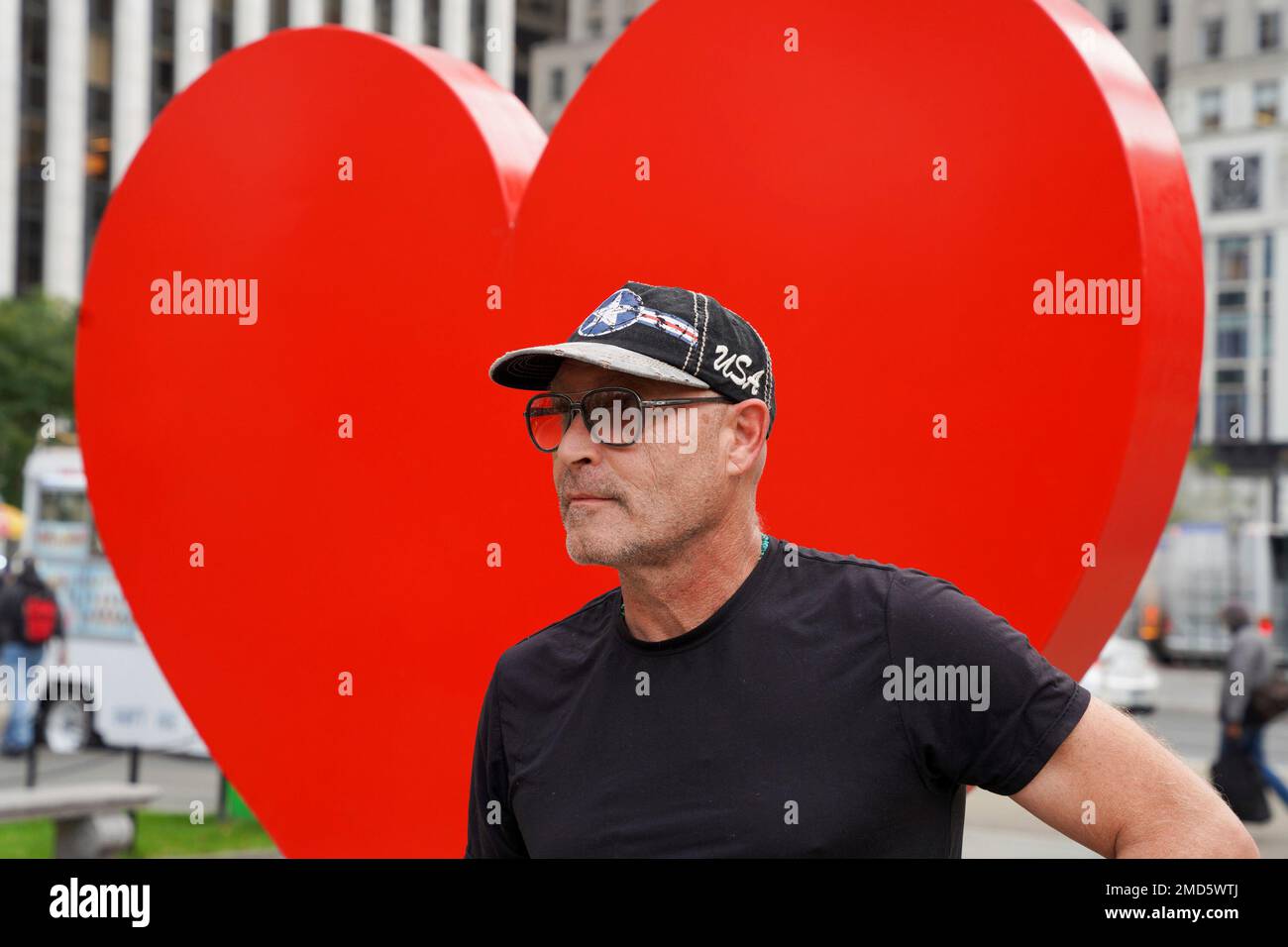 FILE - Italian sculptor Sergio Furnari poses for pictures in front of ...