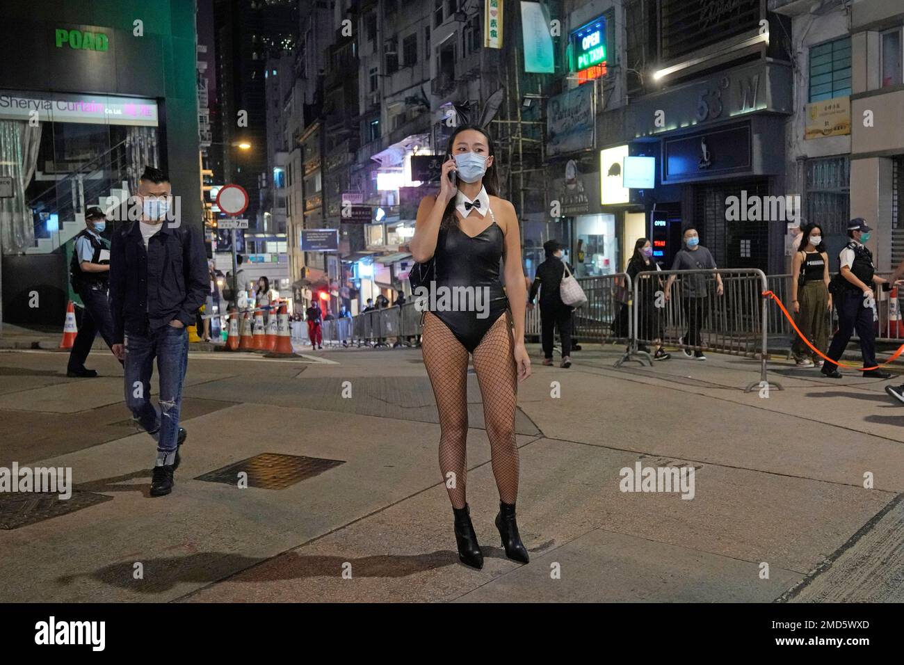 A woman wearing a face mask to prevent the spread of coronavirus ...