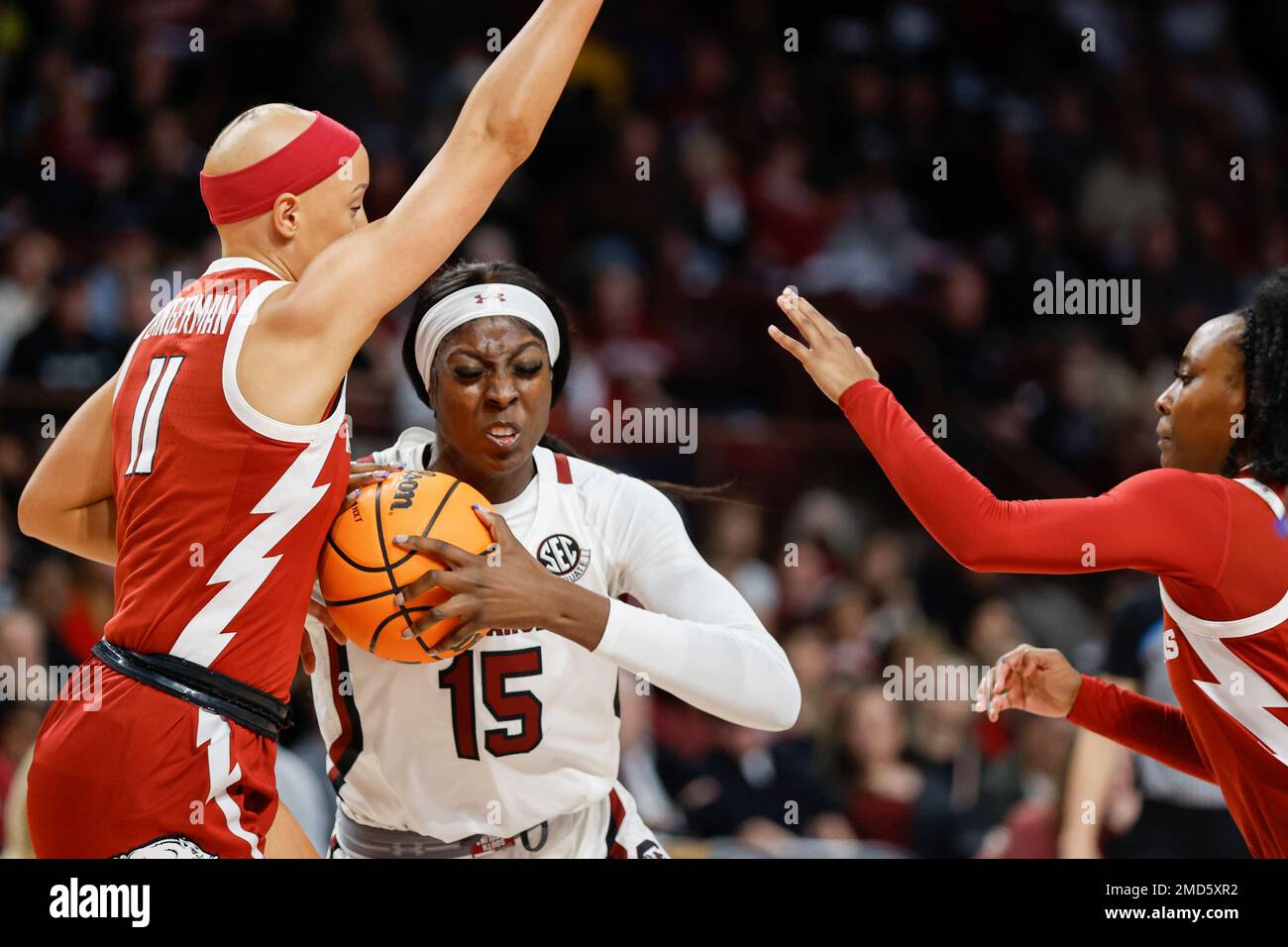 South Carolina forward Laeticia Amihere (15) rives into Arkansas guard ...