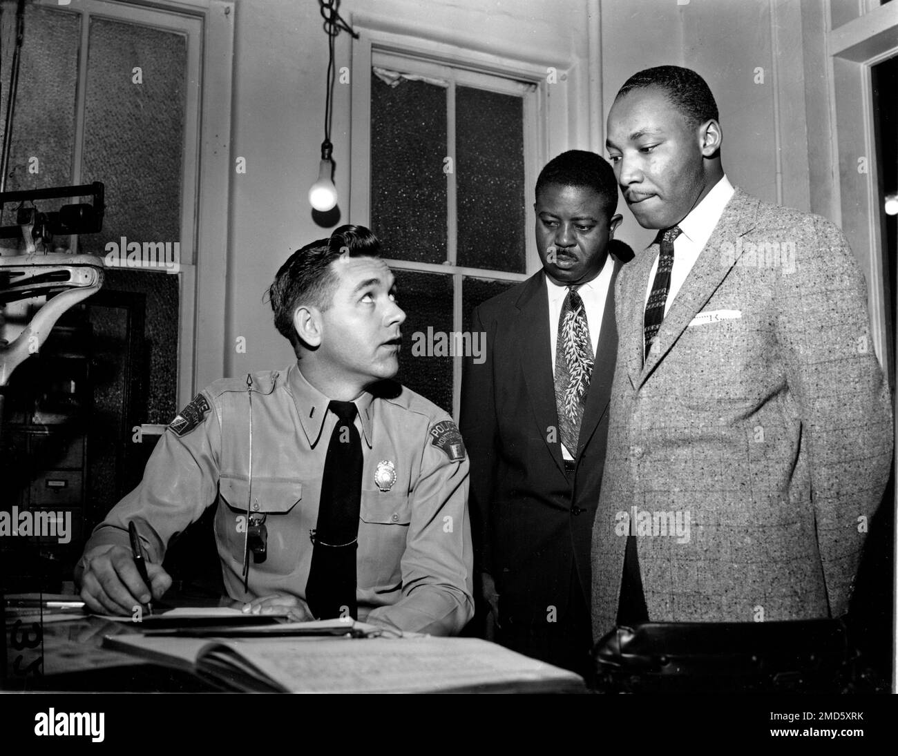 FILE - The Rev. Martin Luther King Jr., right, accompanied by Rev ...
