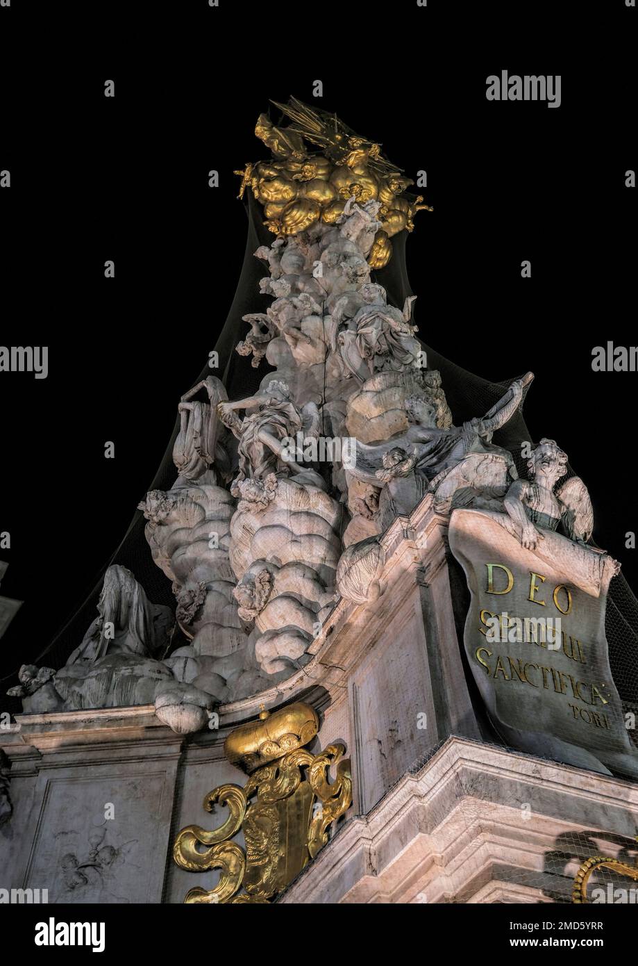Vienna, Austria, Dec. 2022: Night view of Plague Column. A memorial ...