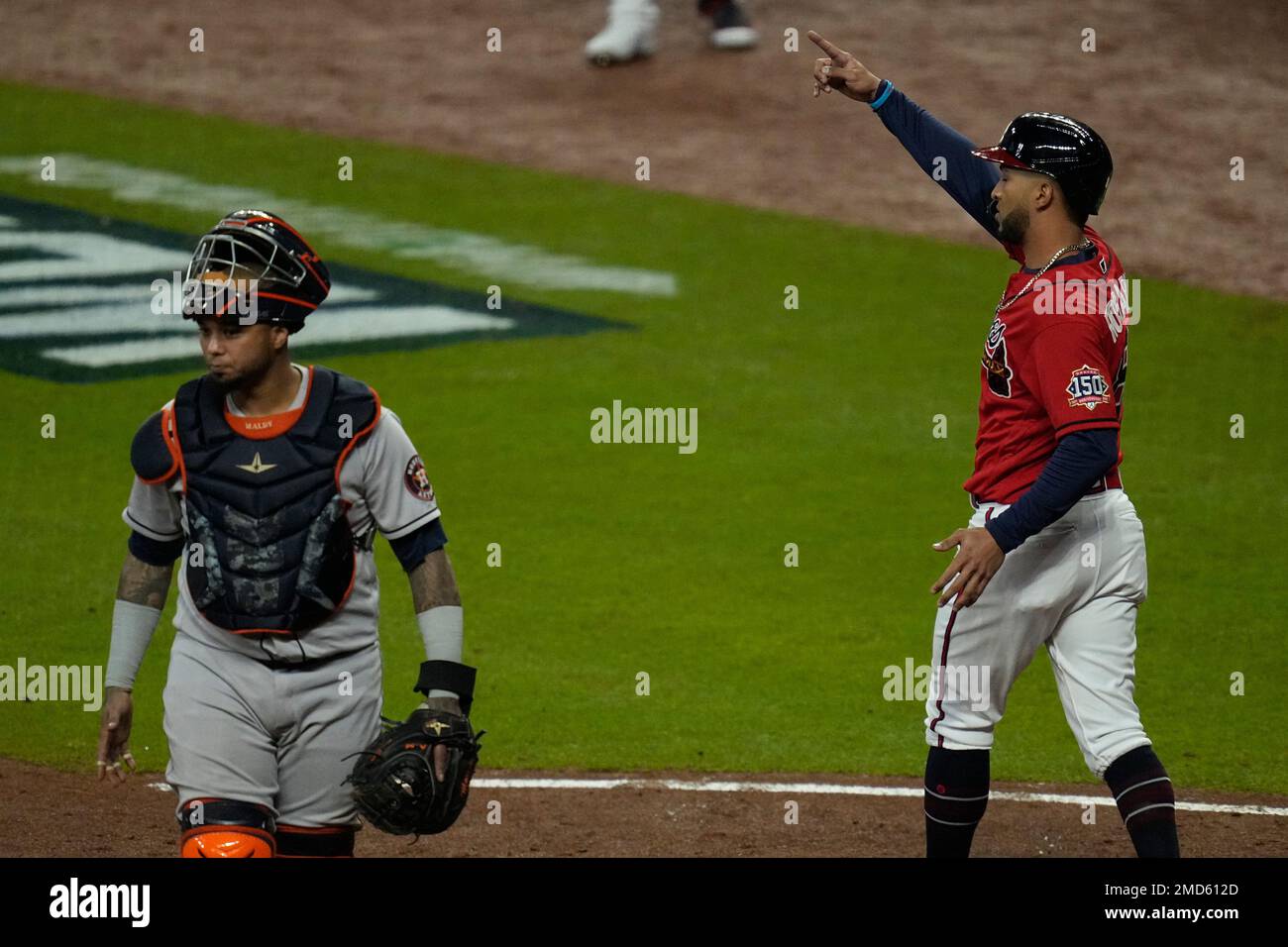 Atlanta Braves' Eddie Rosario celebrates after scoring on a double by ...
