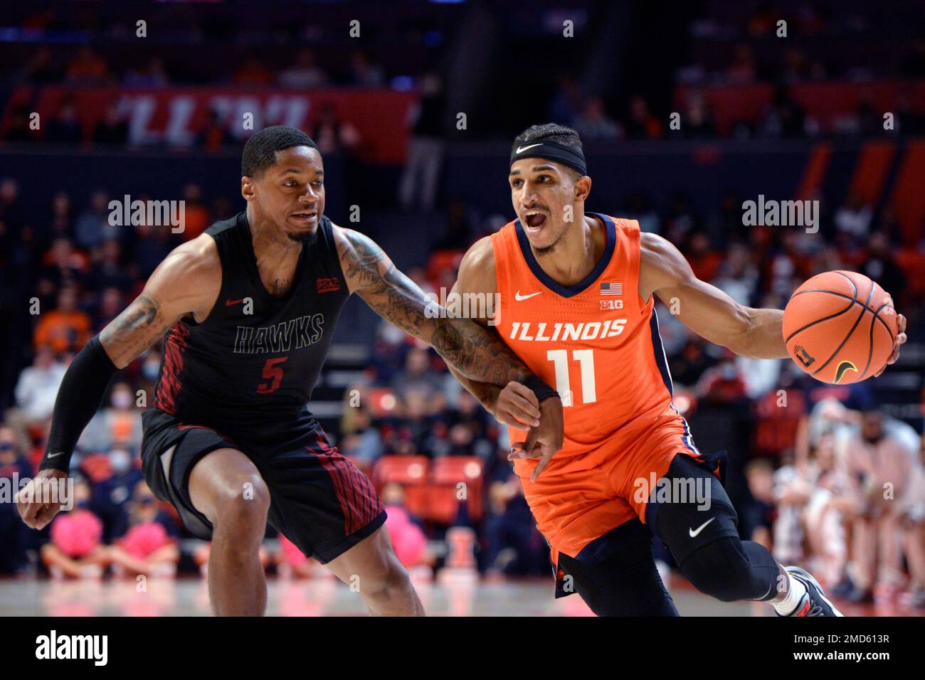 Illinois' Alfonso Plummer (11) drives on Indiana of Pennsylvania guard ...