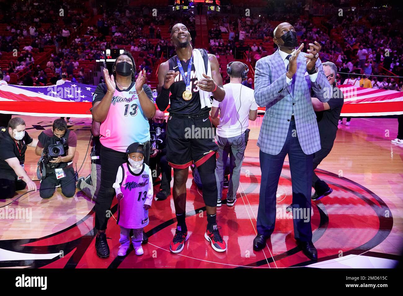 Miami Heat center Bam Adebayo (13), center his mother Marilyn Blount and former player Alonzo ...
