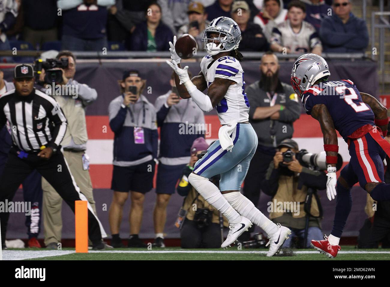 Dallas Cowboys' CeeDee Lamb catches a touchdown pass against the New England Patriots during an ...