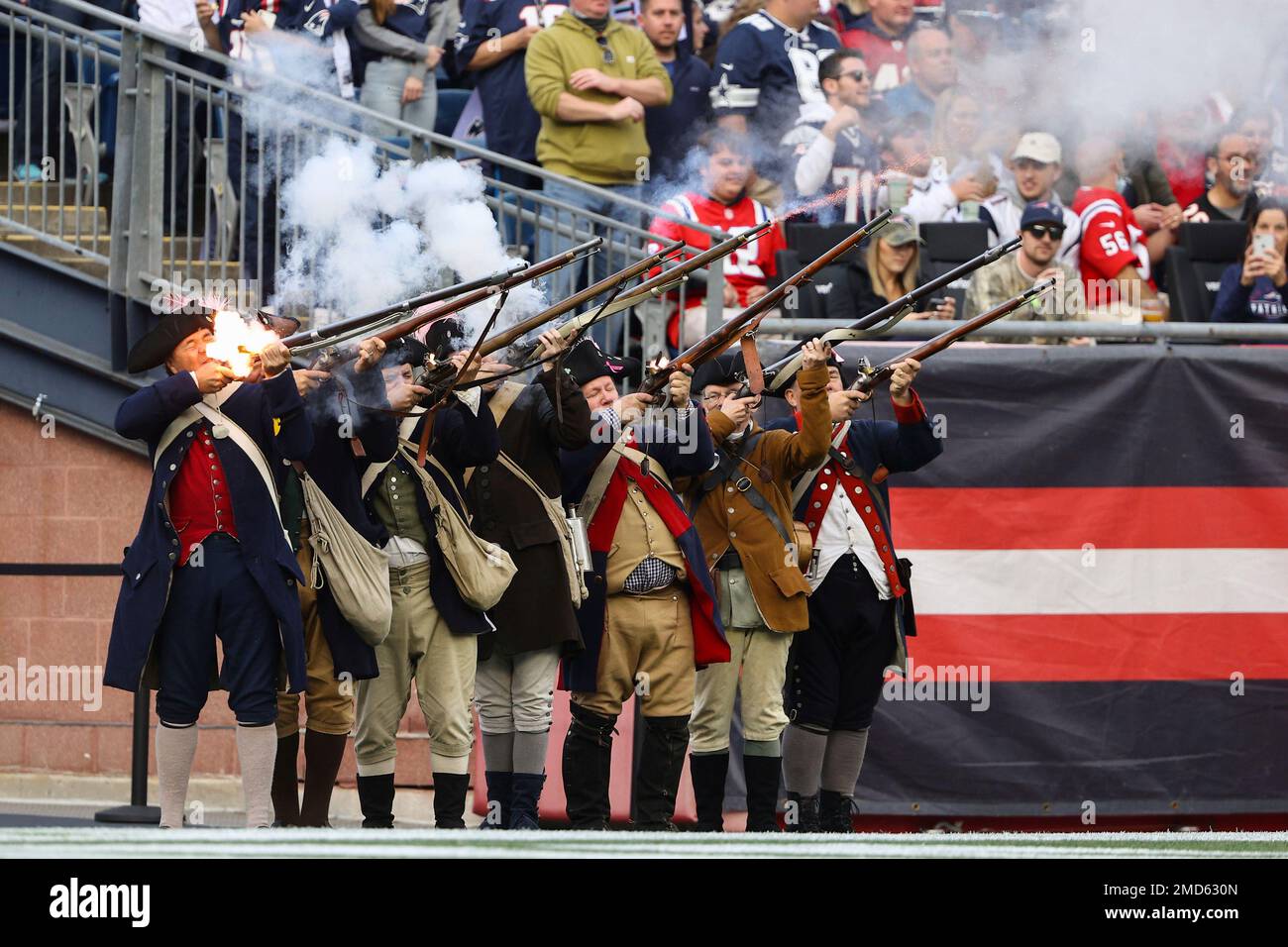 The End Zone Militia fire their guns before an NFL football game ...